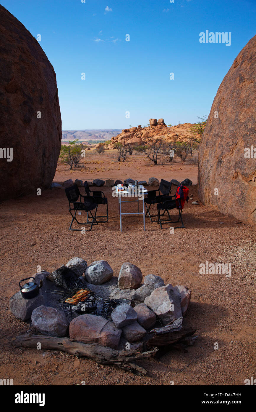 Cooking toast on a campfire at campsite at Mowani Mountain Camp, near ...