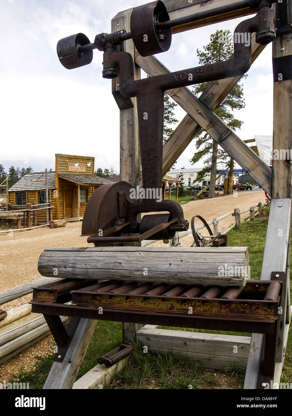 This antique table saw is a tool used for cutting wood, known for its ...