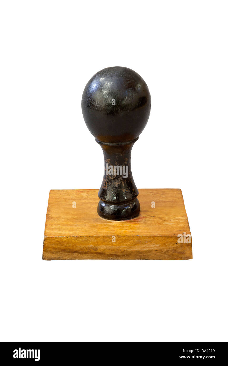 old wooden stamp isolated on white background Stock Photo - Alamy