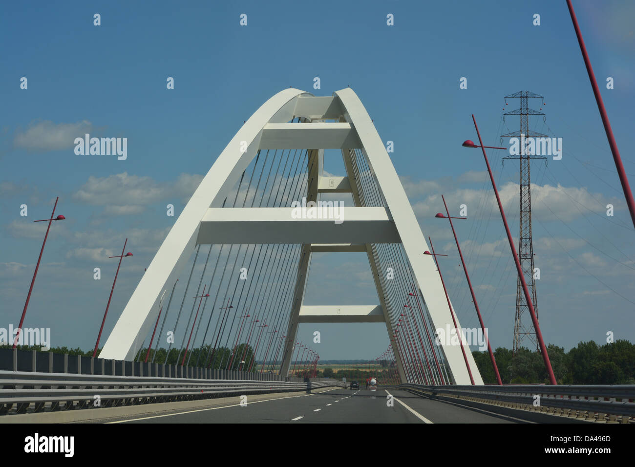 The Pentele Bridge spans the Danube River, forming a key part of the transition between two ...