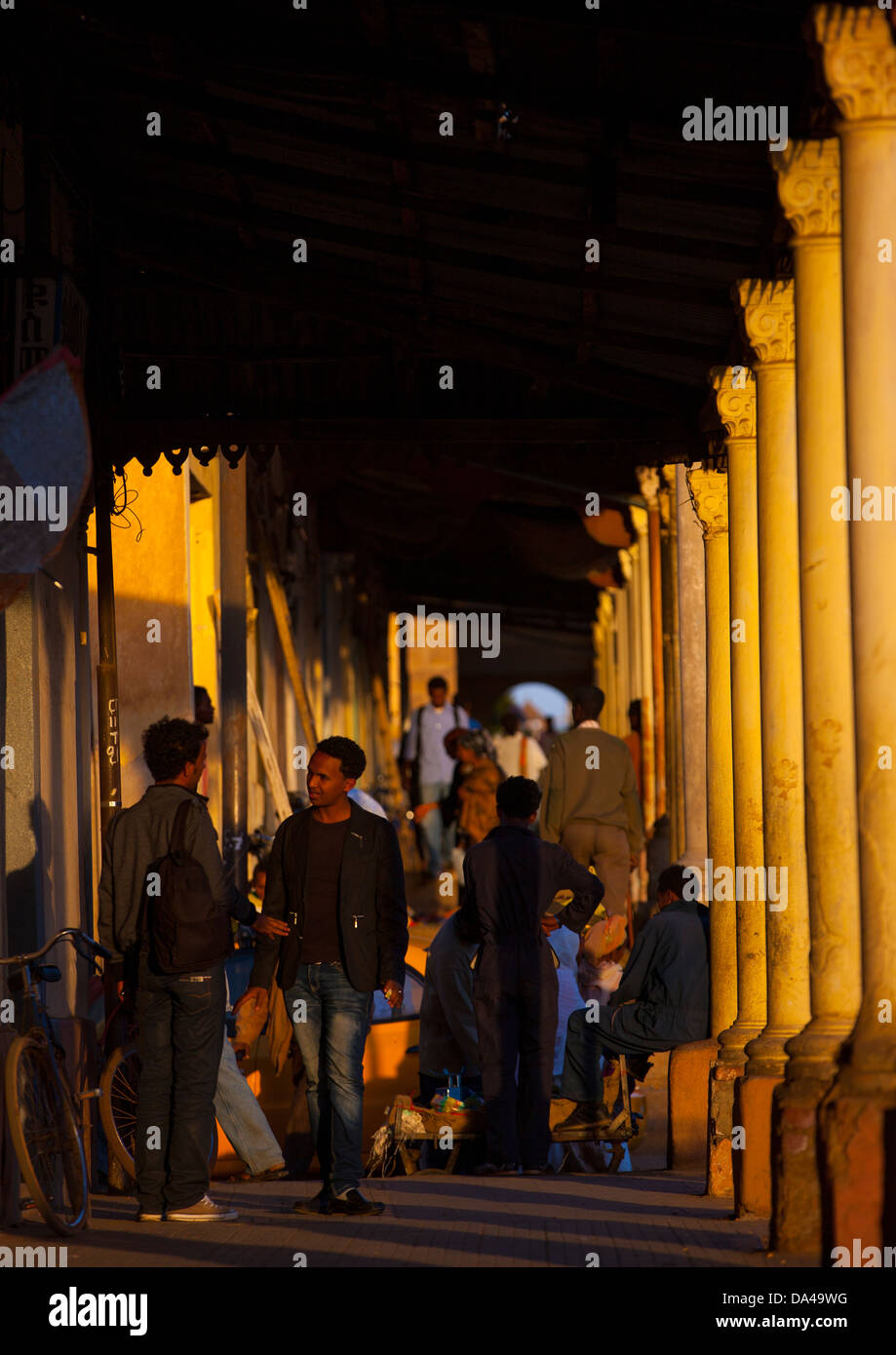 People Walking Under Arcades, Asmara, Eritrea Stock Photo - Alamy