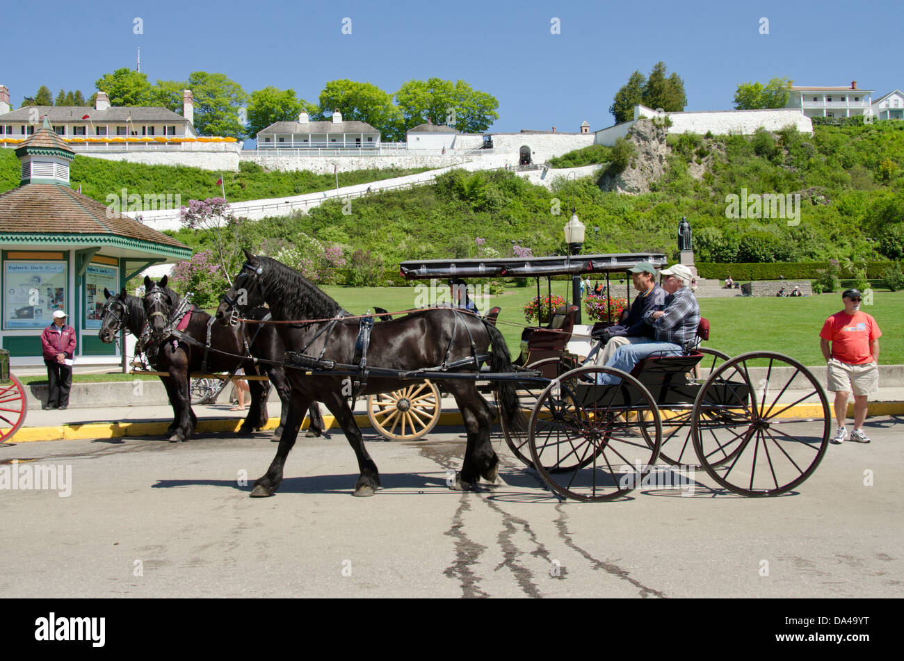 Michigan, Mackinac Island, Main Street (aka Huron). Traditional horse ...