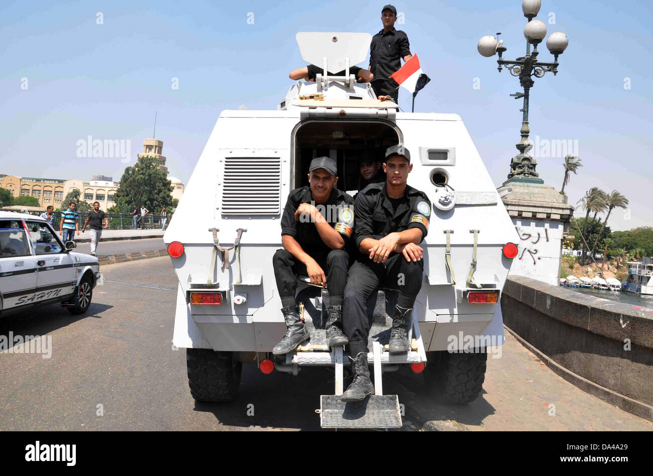 Cairo, Cairo, Egypt. 3rd July, 2013. Egyptian police special forces sit ...