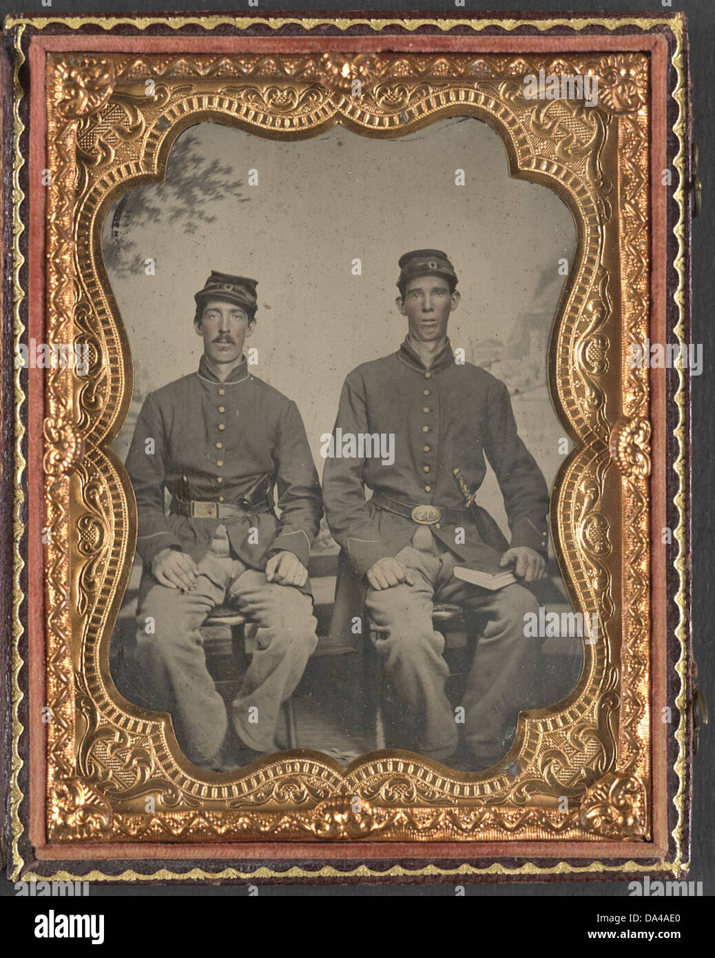 [Two unidentified soldiers in Union uniforms with sword and book in ...