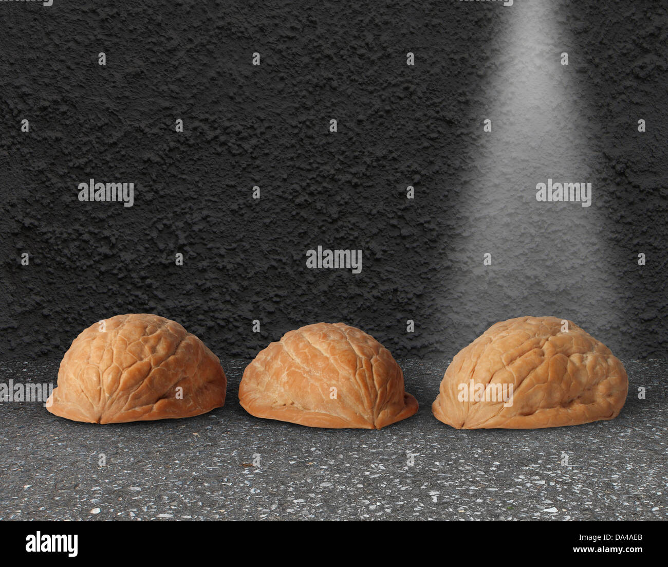 Shell game with three walnut shells on city street pavement with a ...