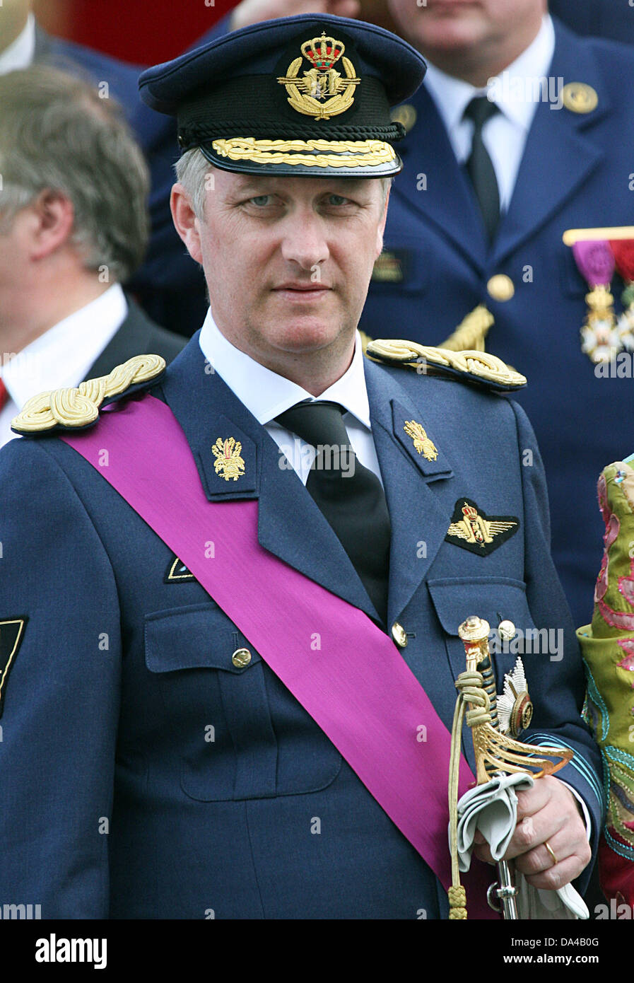 Prince Philippe of Belgium watches a parade in front of the royal ...