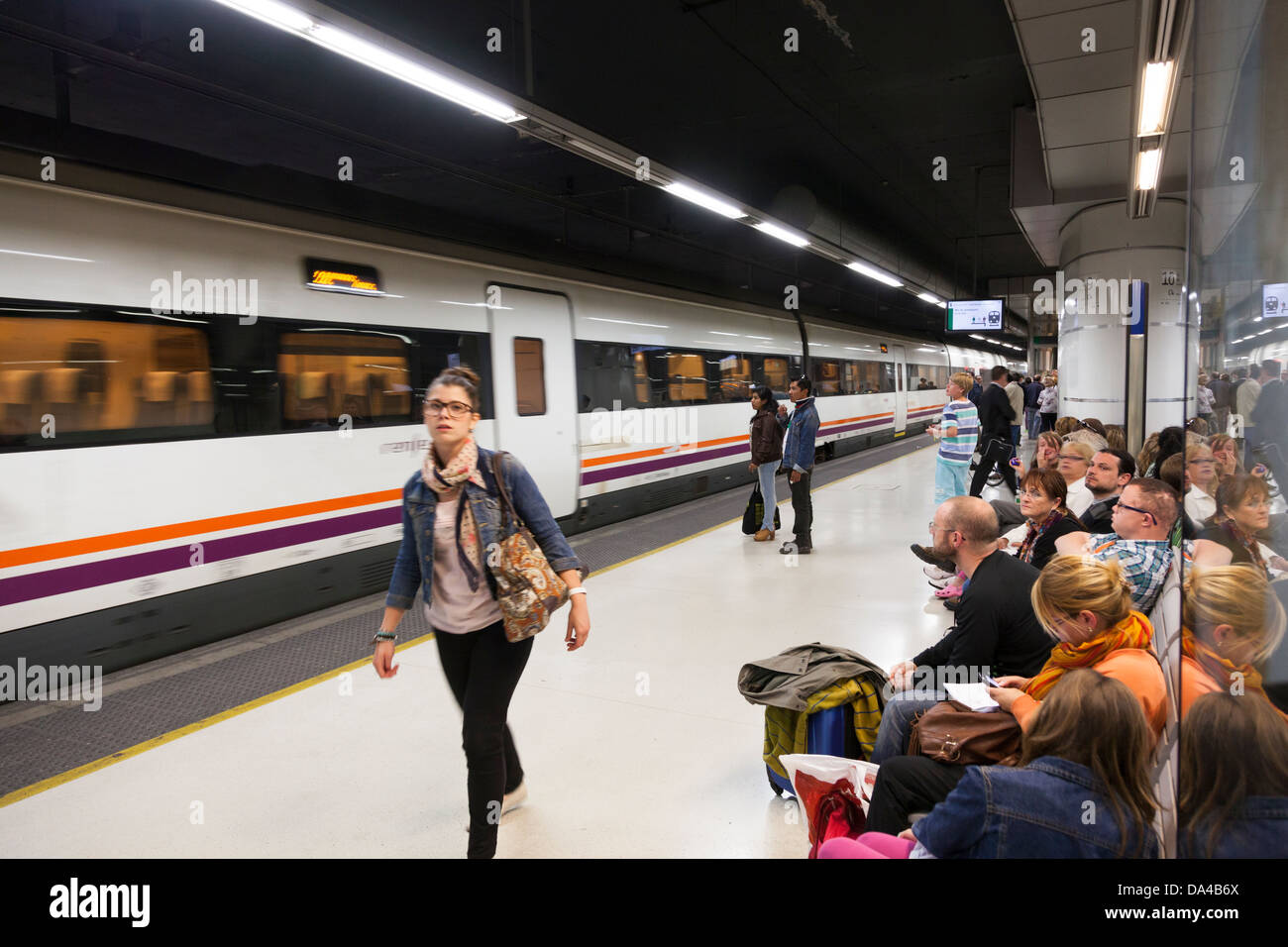 Crowd passengers wait board hi-res stock photography and images - Alamy