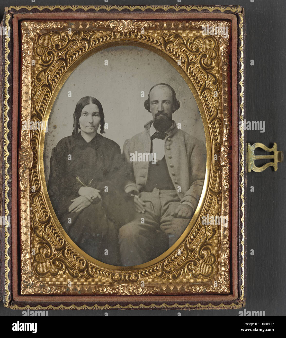 [Unidentified soldier in Confederate uniform and his wife, Sarah A ...