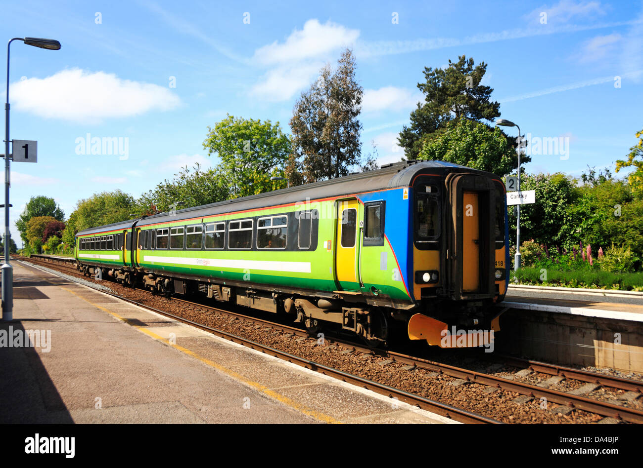 A diesel train on the Wherry Line stopped at Cantley Station, Norfolk ...