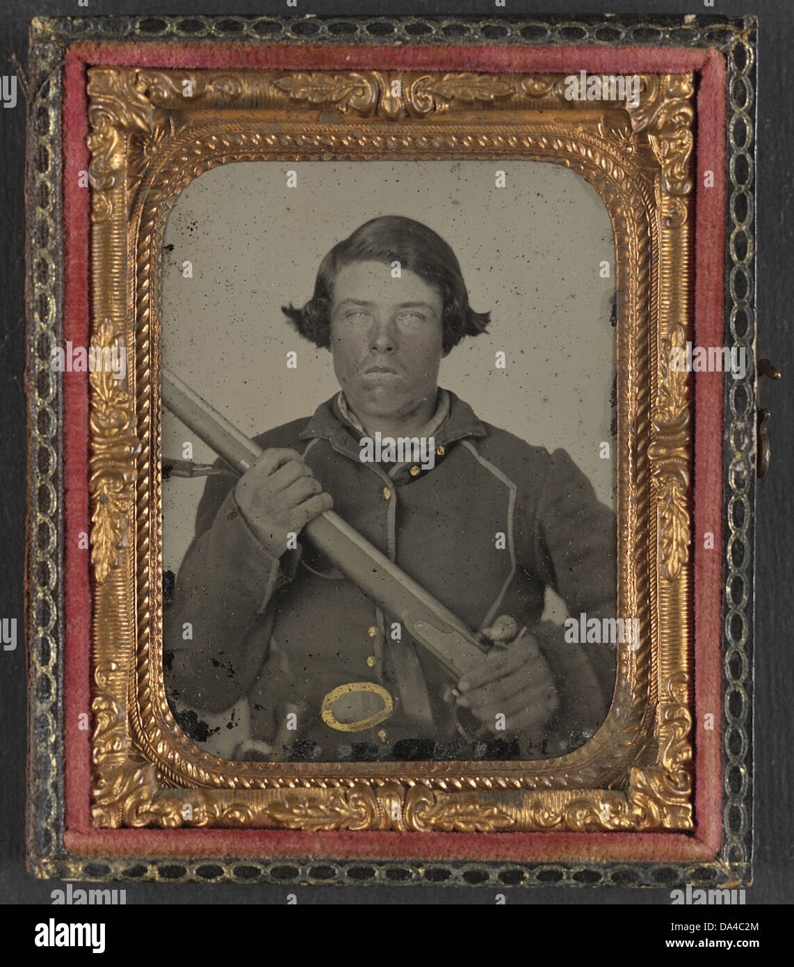 [Unidentified soldier in Union uniform and U.S. belt buckle with musket ...