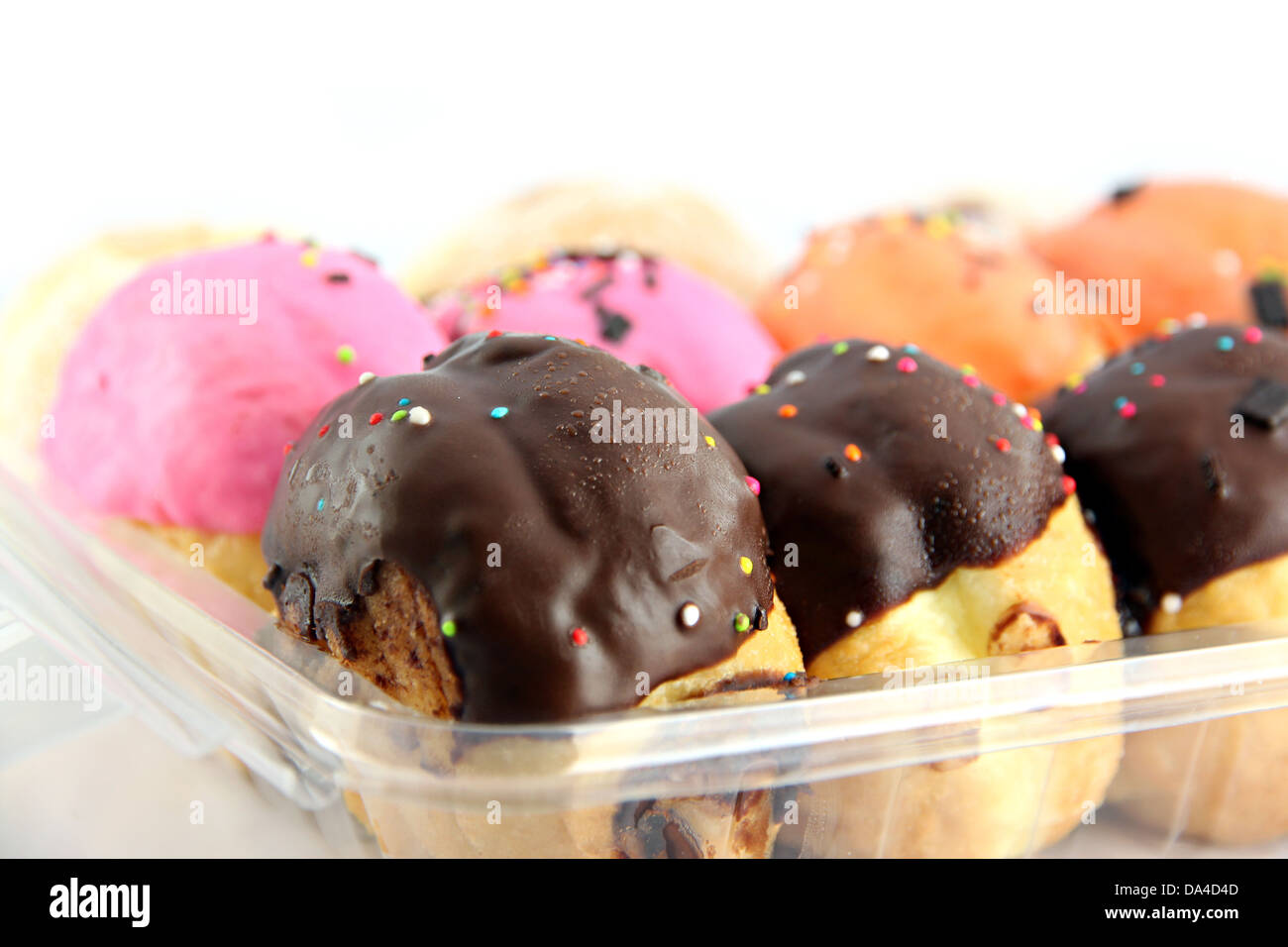 Many donuts flavor combinations on the white background Stock Photo - Alamy