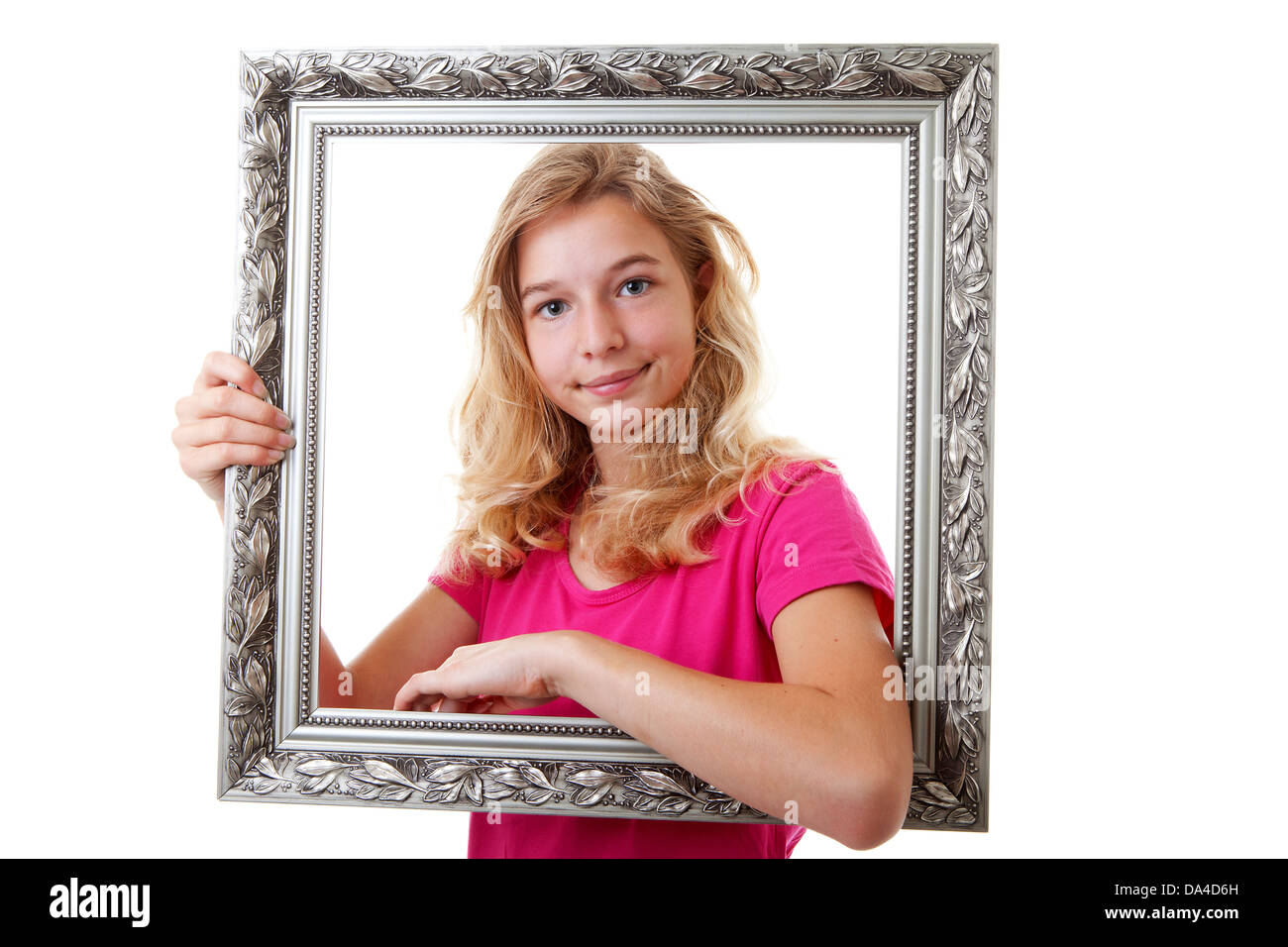 Girl is holding decorated frame over white background Stock Photo - Alamy