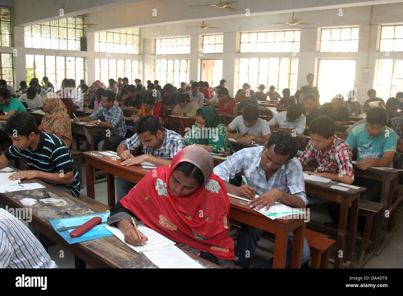 Dhaka, Bangladesh. 3rd July, 2013. Bangladeshi students sit for their ...