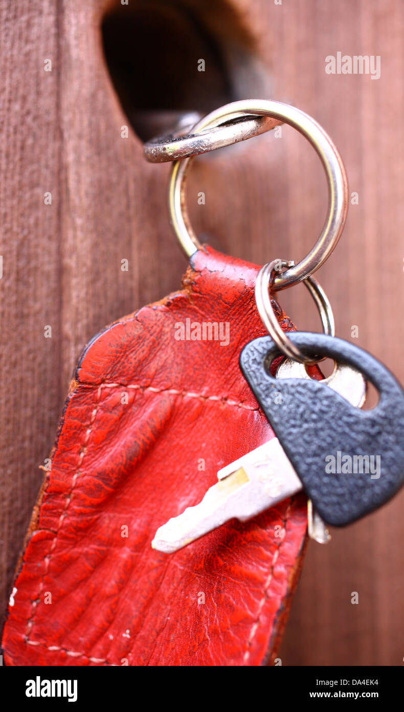 Old key positioned in shed lock Stock Photo - Alamy