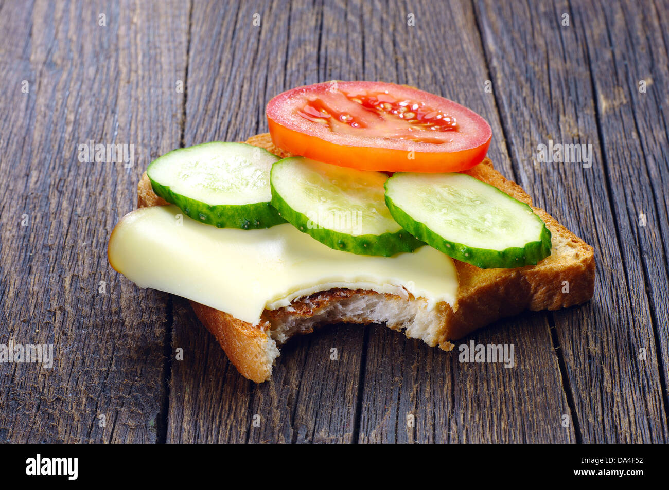 Bitten tomato hi-res stock photography and images - Alamy