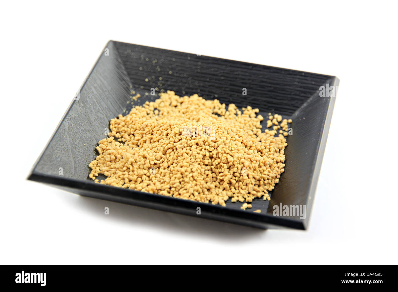 Ginger powder in black Cut Out Stock Images & Pictures - Alamy