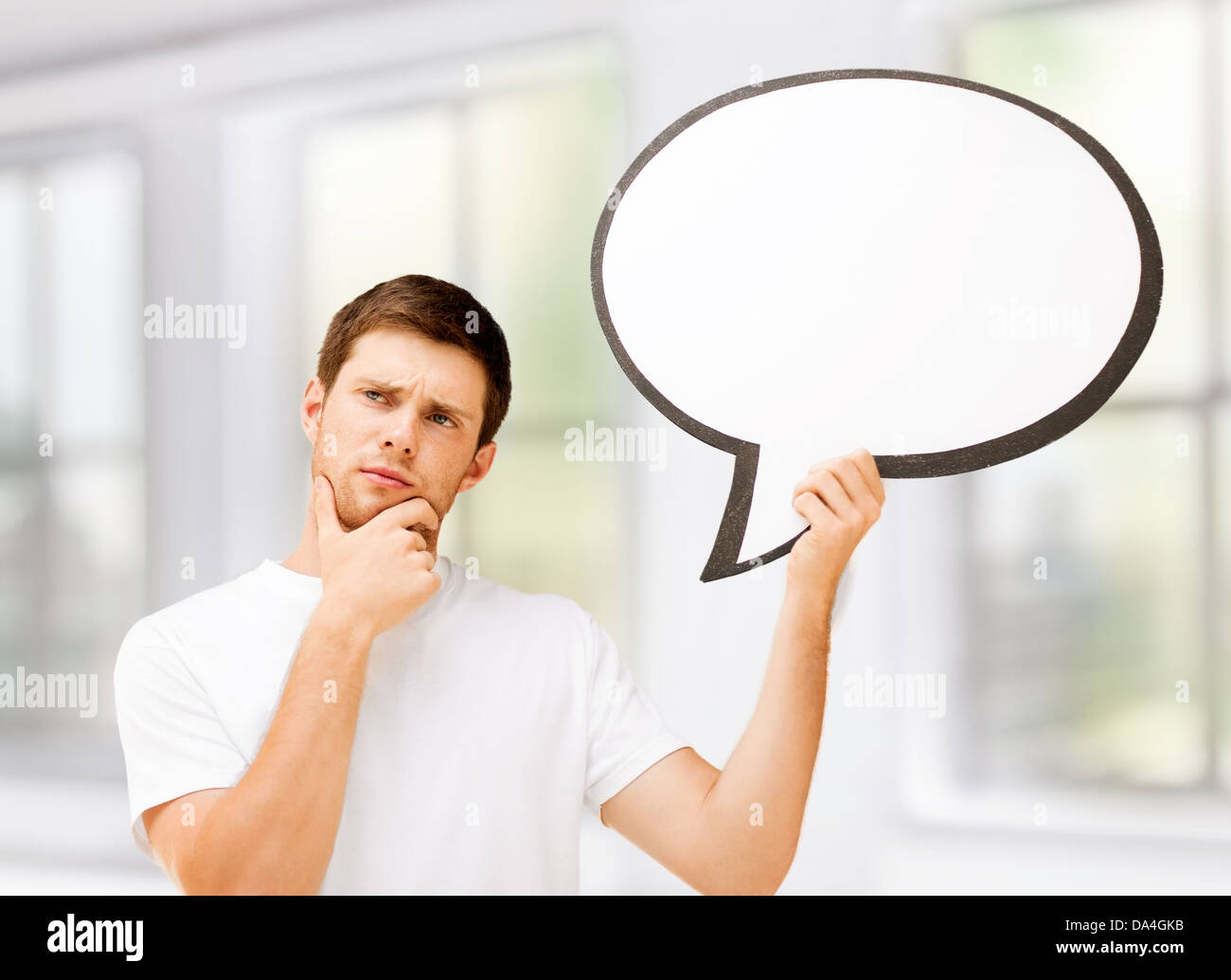 young man with blank text bubble Stock Photo - Alamy