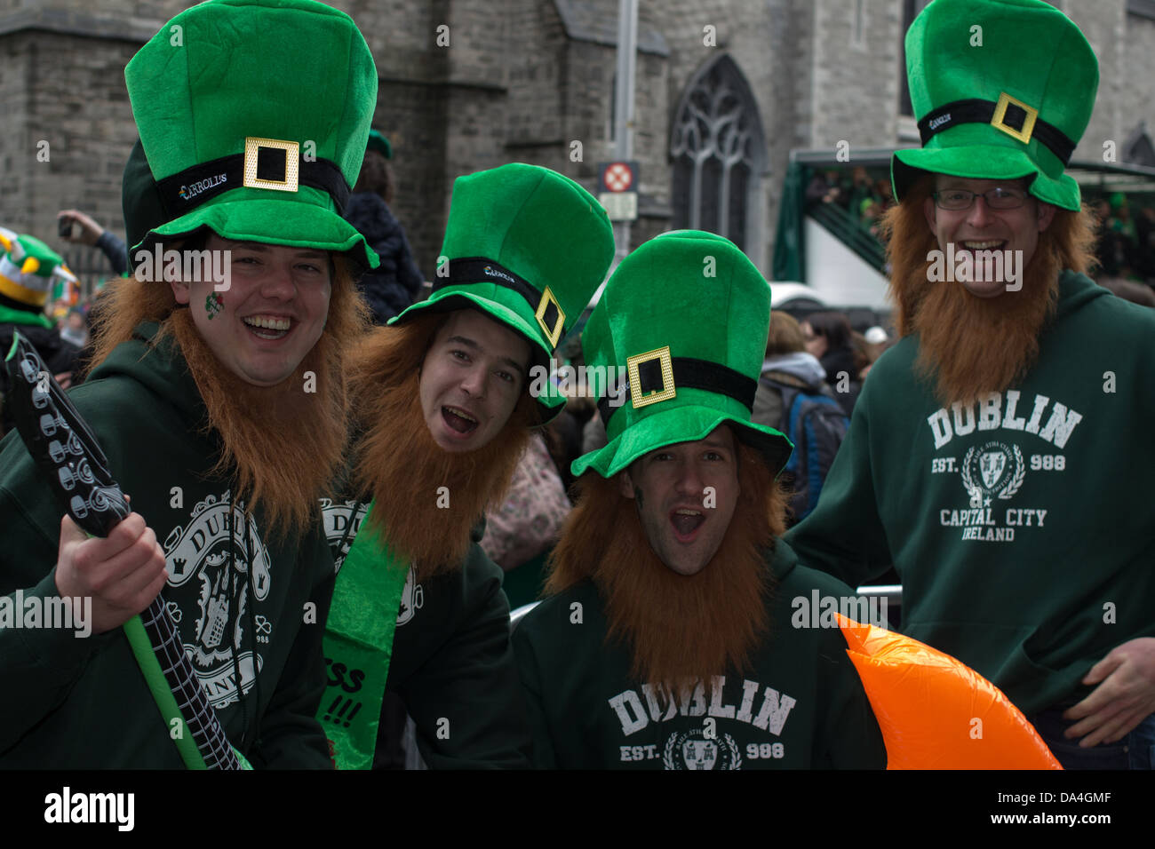 Four male spectators wearing green hats pose for a photograph, St ...
