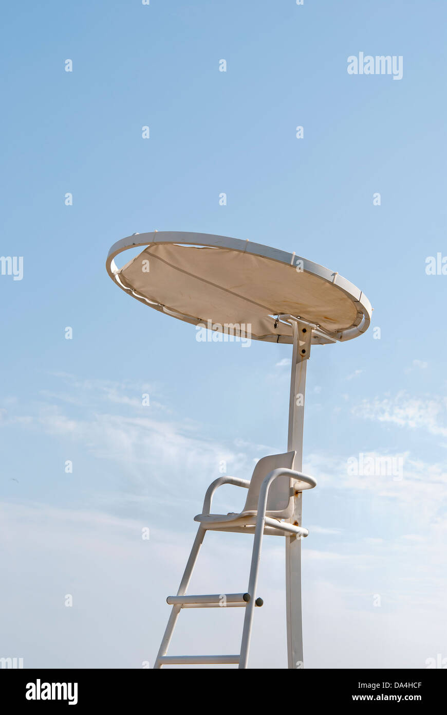 Lifeguard post on blue sky background Stock Photo - Alamy