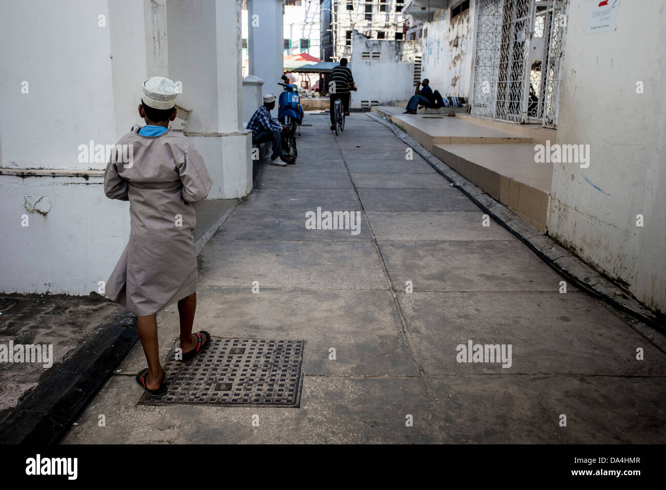 Muslim boy in the streets of Stone Town, Zanzibar - Tanzania Stock ...