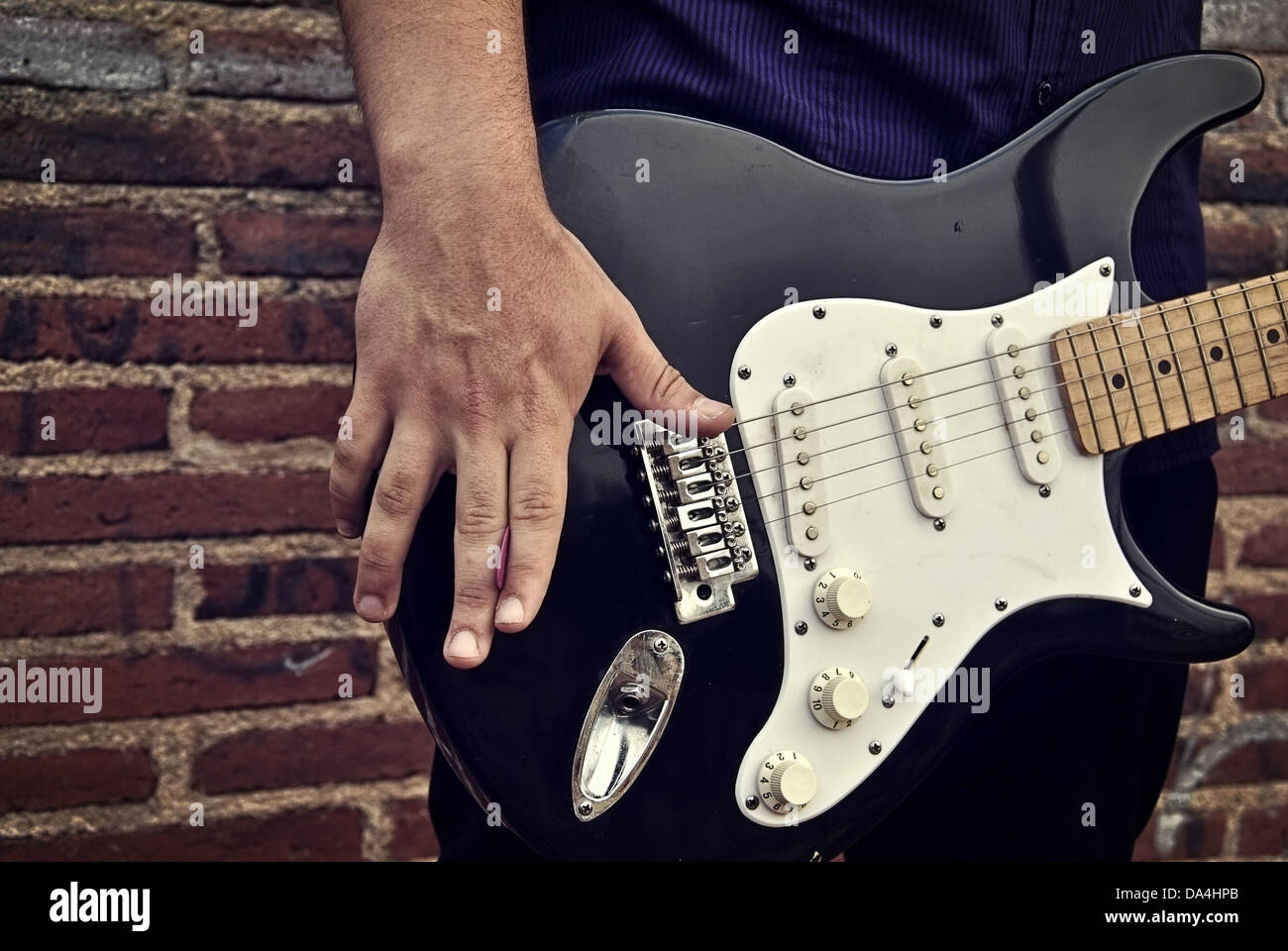 electric guitar being played by a rocker Stock Photo - Alamy