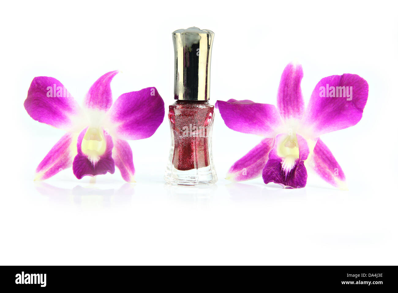 The Purple orchid and brown Perfume bottles Stock Photo - Alamy