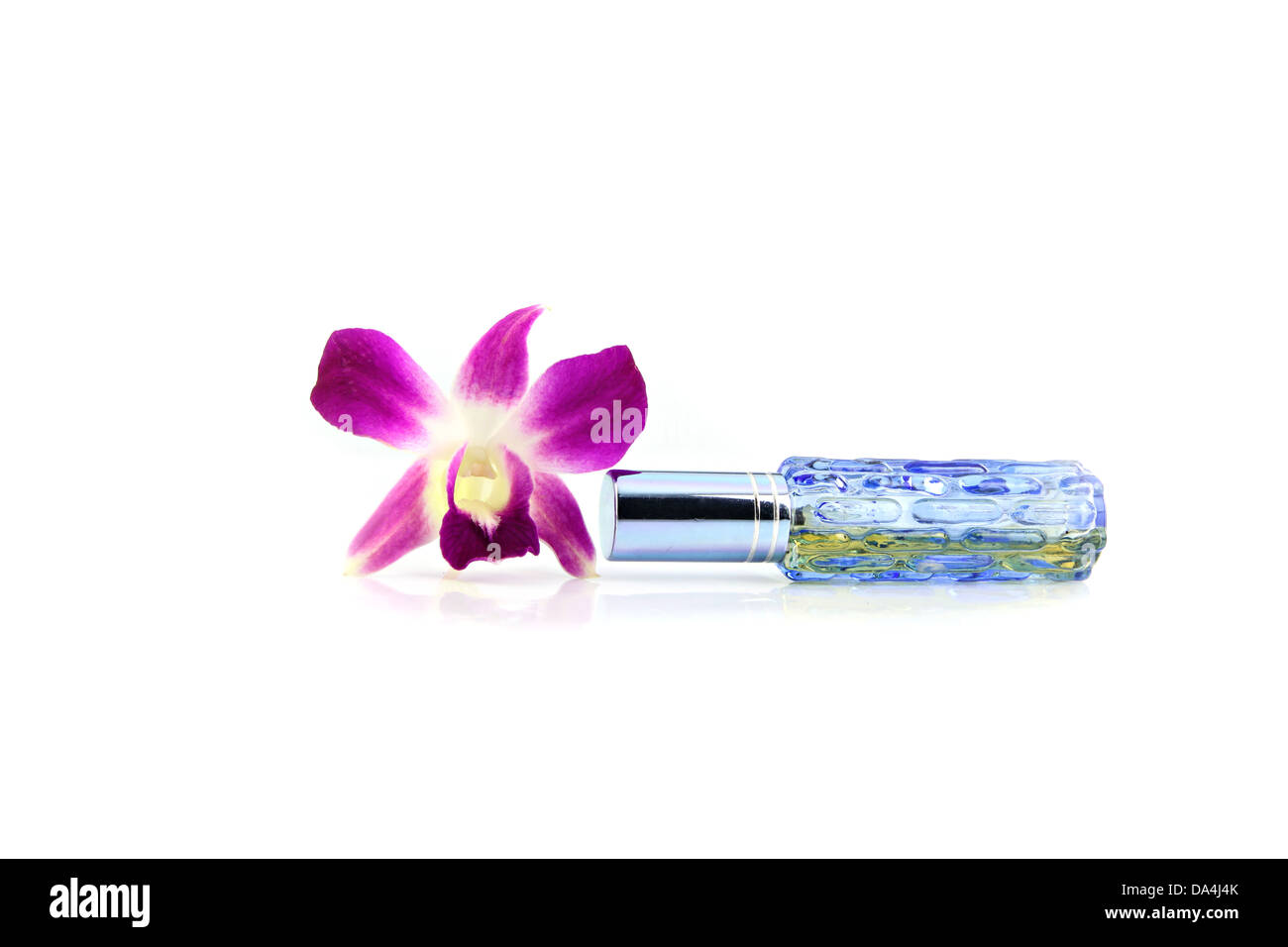 The Purple orchid and blue color Perfume bottles on the white ...