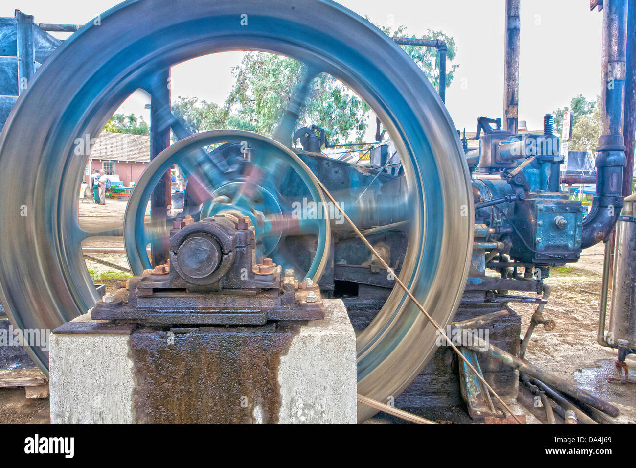 spinning drive shaft of antique engine Stock Photo - Alamy