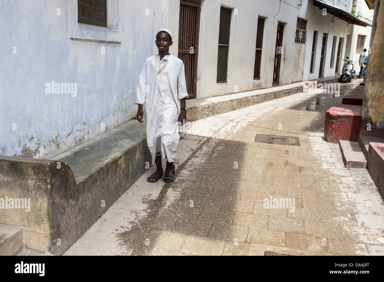 Muslim boy in the streets of Stone Town, Zanzibar - Tanzania Stock ...
