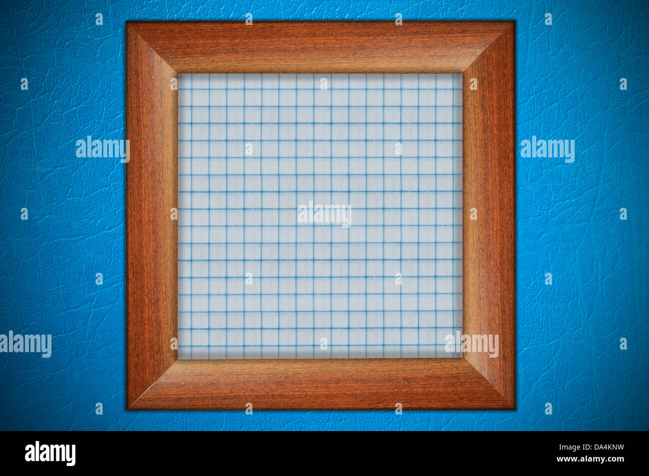 Wood frame with paper fill at blue wall Stock Photo - Alamy