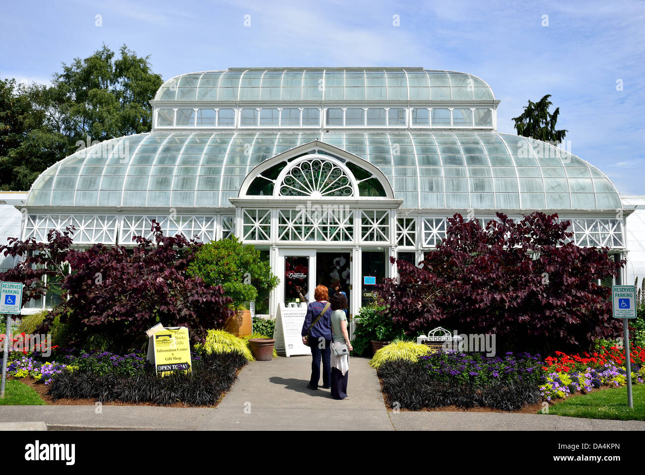 Tourists visit the Glass House at the Volunteer Park. Seattle ...