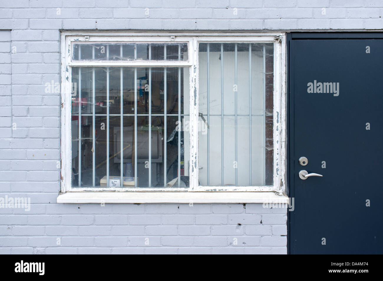 Security bars fitted behind window as crime prevention measure to deter ...