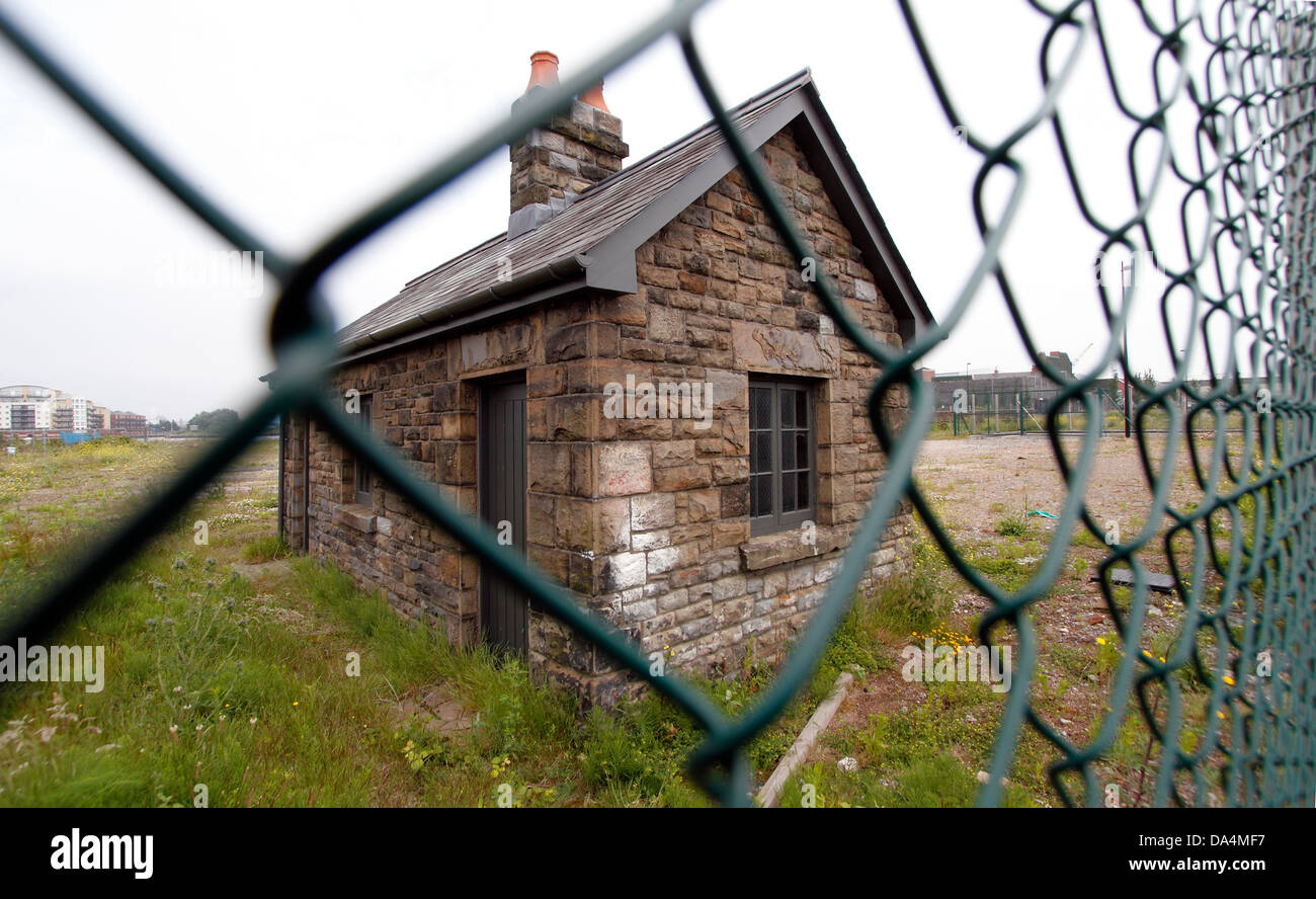 stone built storage hut on Cardiff Docks Stock Photo - Alamy