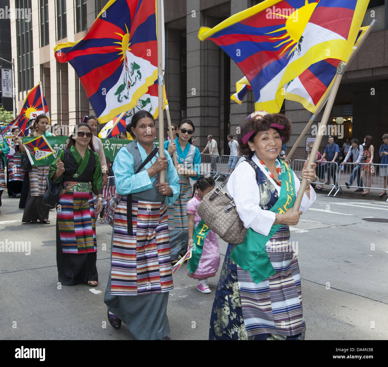 Tibetan refugees and & full fledged Tibetan Americans march in the ...