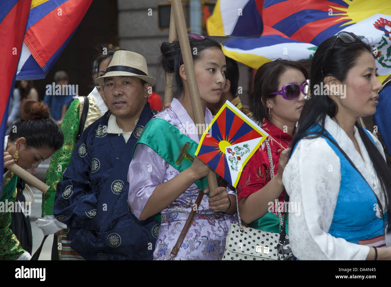 Tibetan refugees and & full fledged Tibetan Americans march in the ...