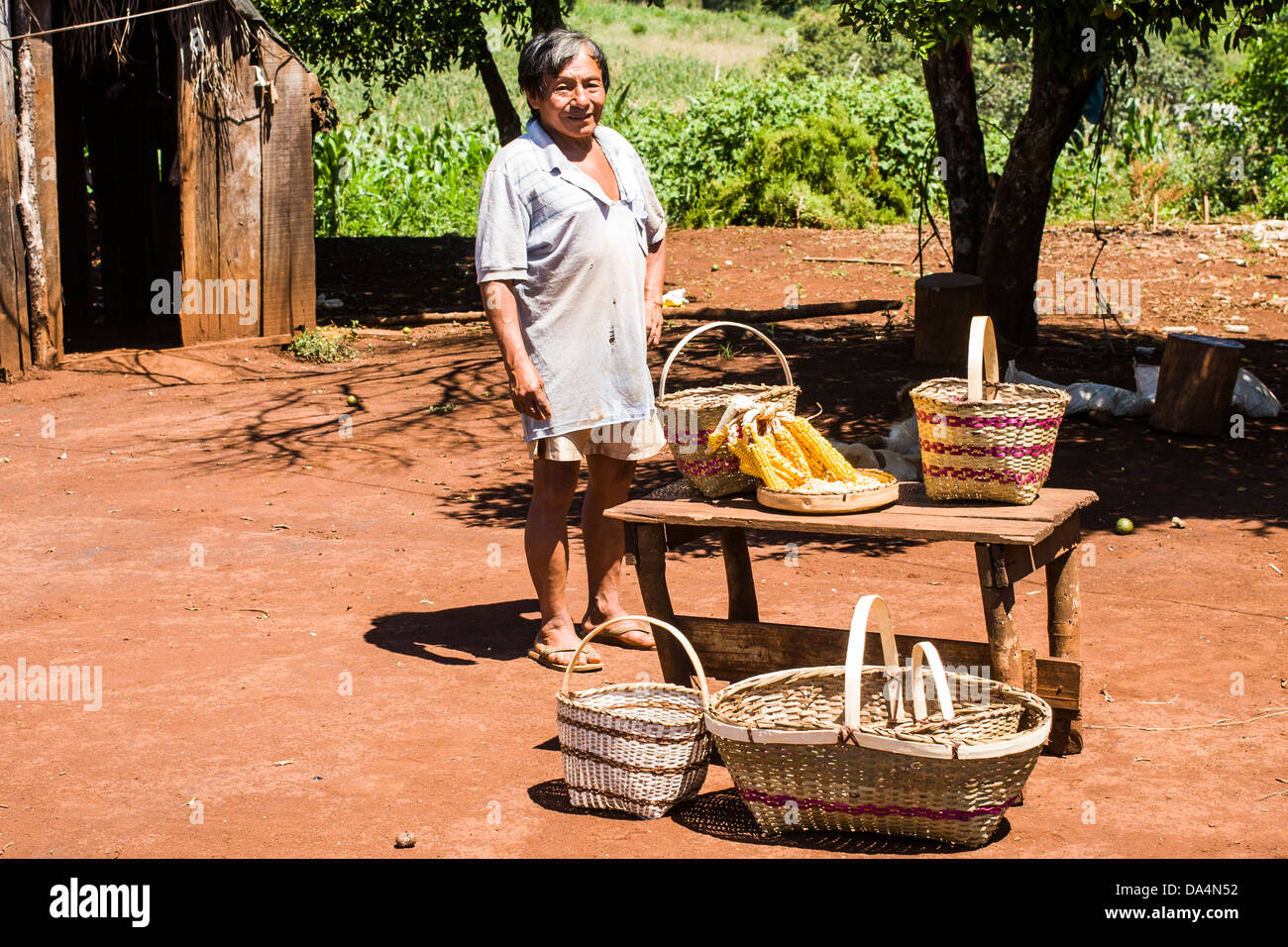 Member of Guarani ethnic group in Xapeco Indian Reserve and some ...