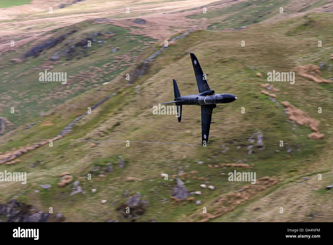 An RAF Hawk jet trainer at low level in Snowdonia Stock Photo - Alamy