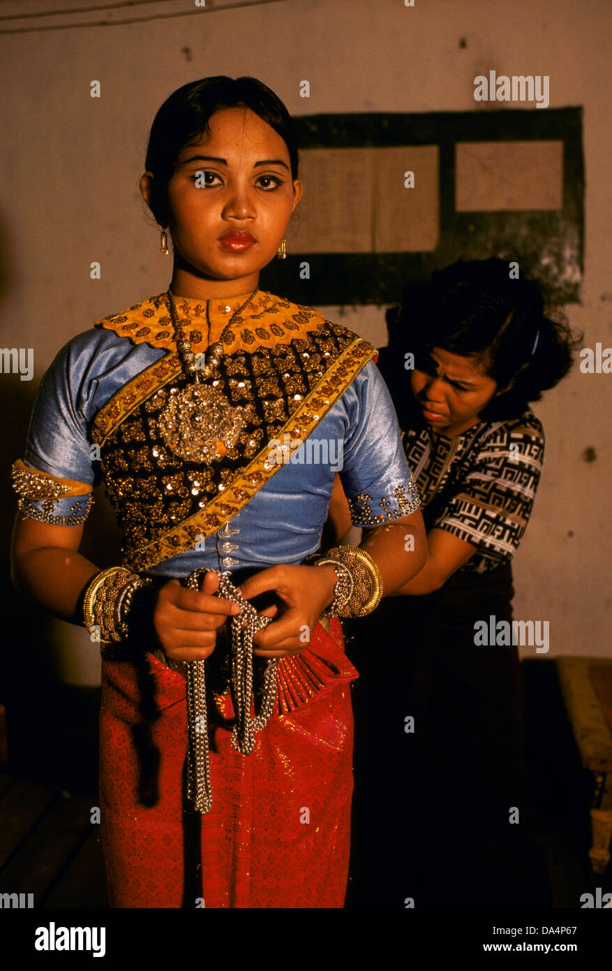 Cambodia: At the School of Fine Arts a young dancer has her headdress ...