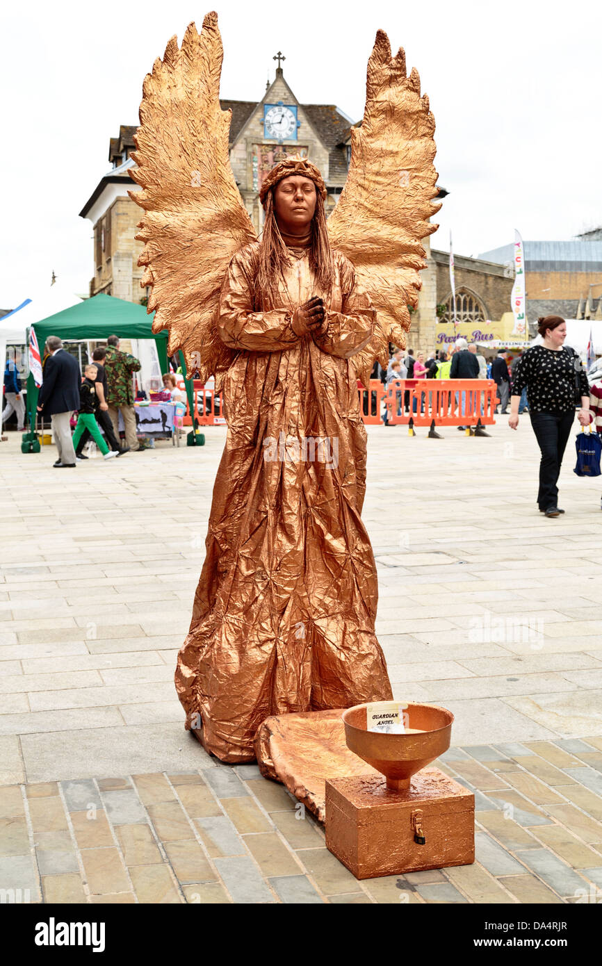 Street performer angel hi-res stock photography and images - Alamy