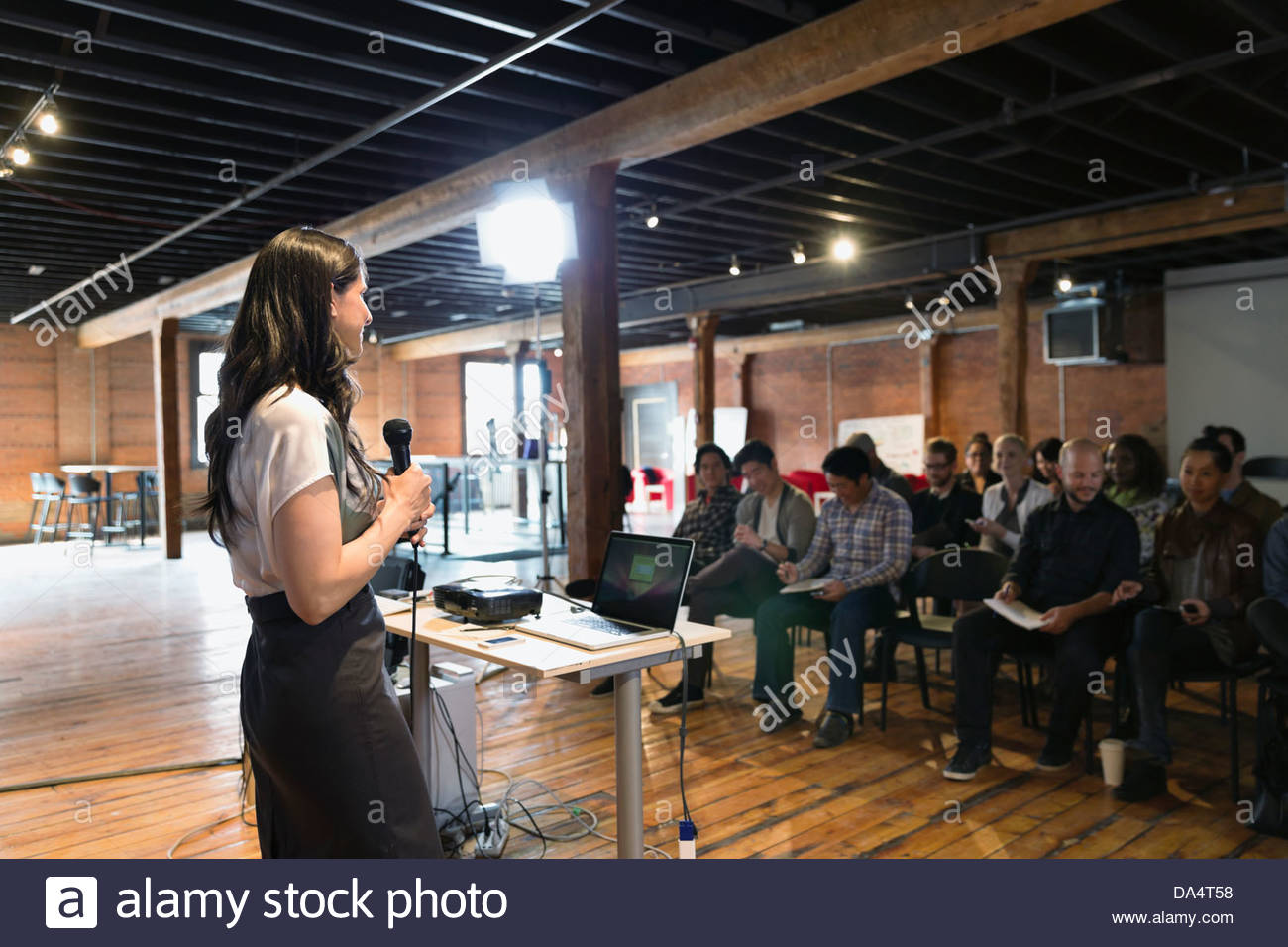 Standing looking away microphone communication hi-res stock photography ...