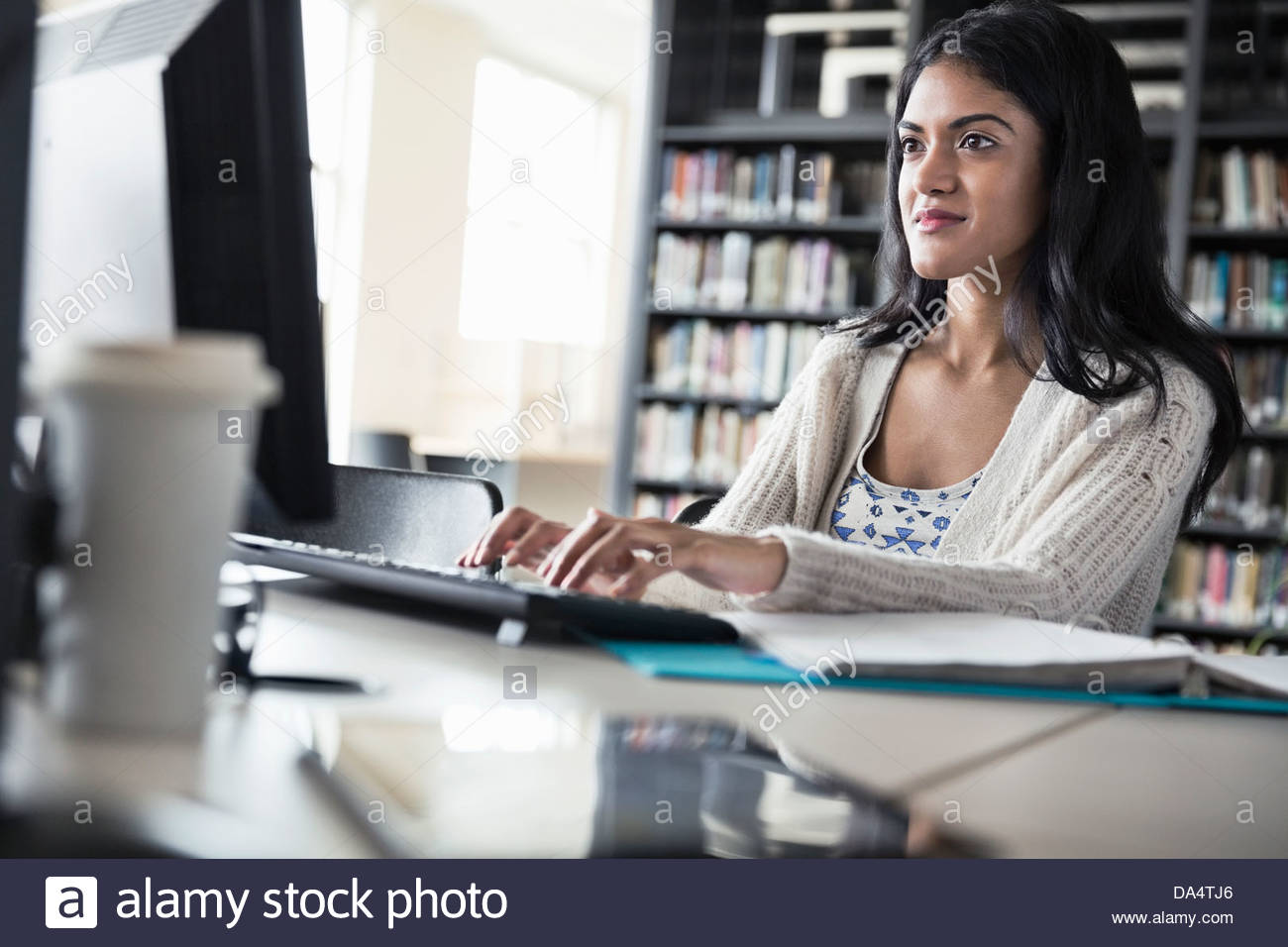 College student typing hi-res stock photography and images - Alamy