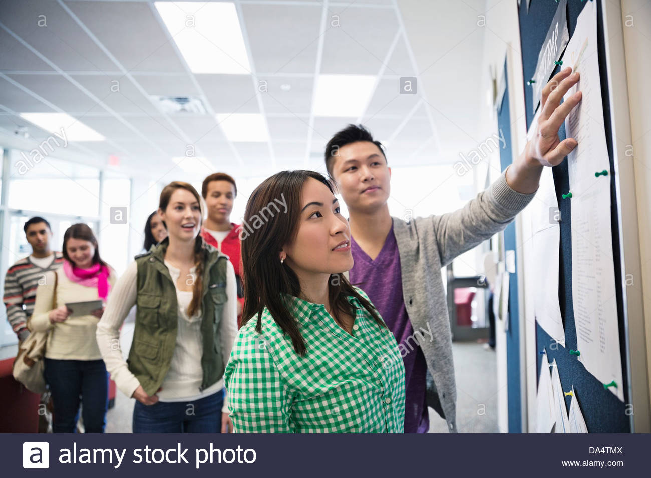 Group checking hi-res stock photography and images - Alamy