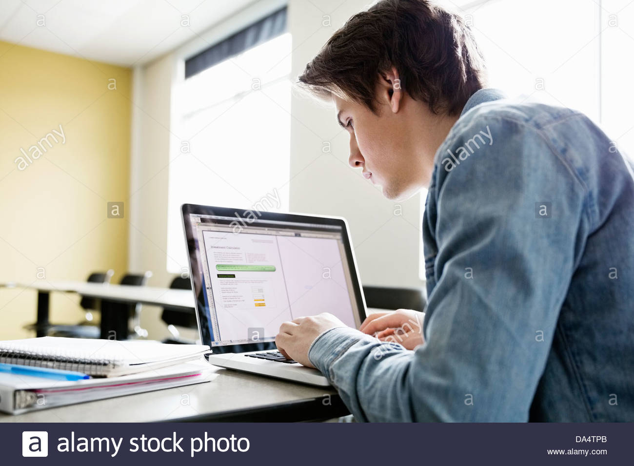 College student typing hi-res stock photography and images - Alamy
