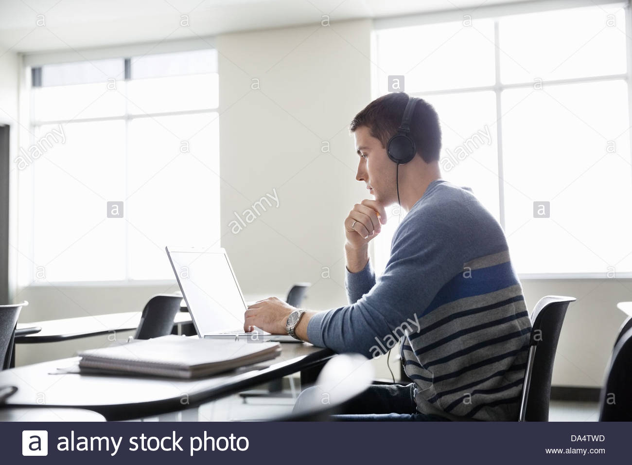 Male student working desk in hi-res stock photography and images - Alamy