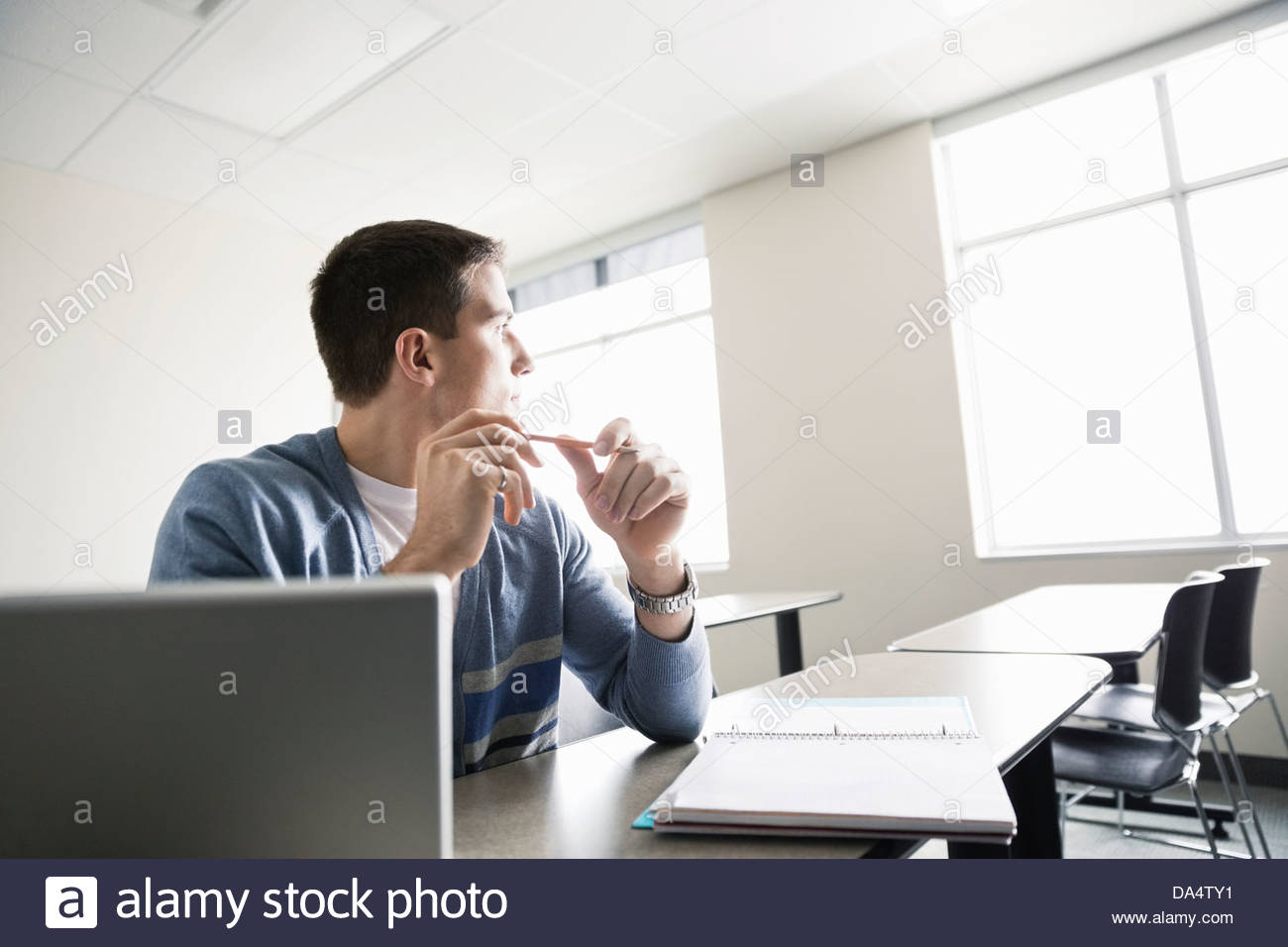 Male thinking student hi-res stock photography and images - Alamy