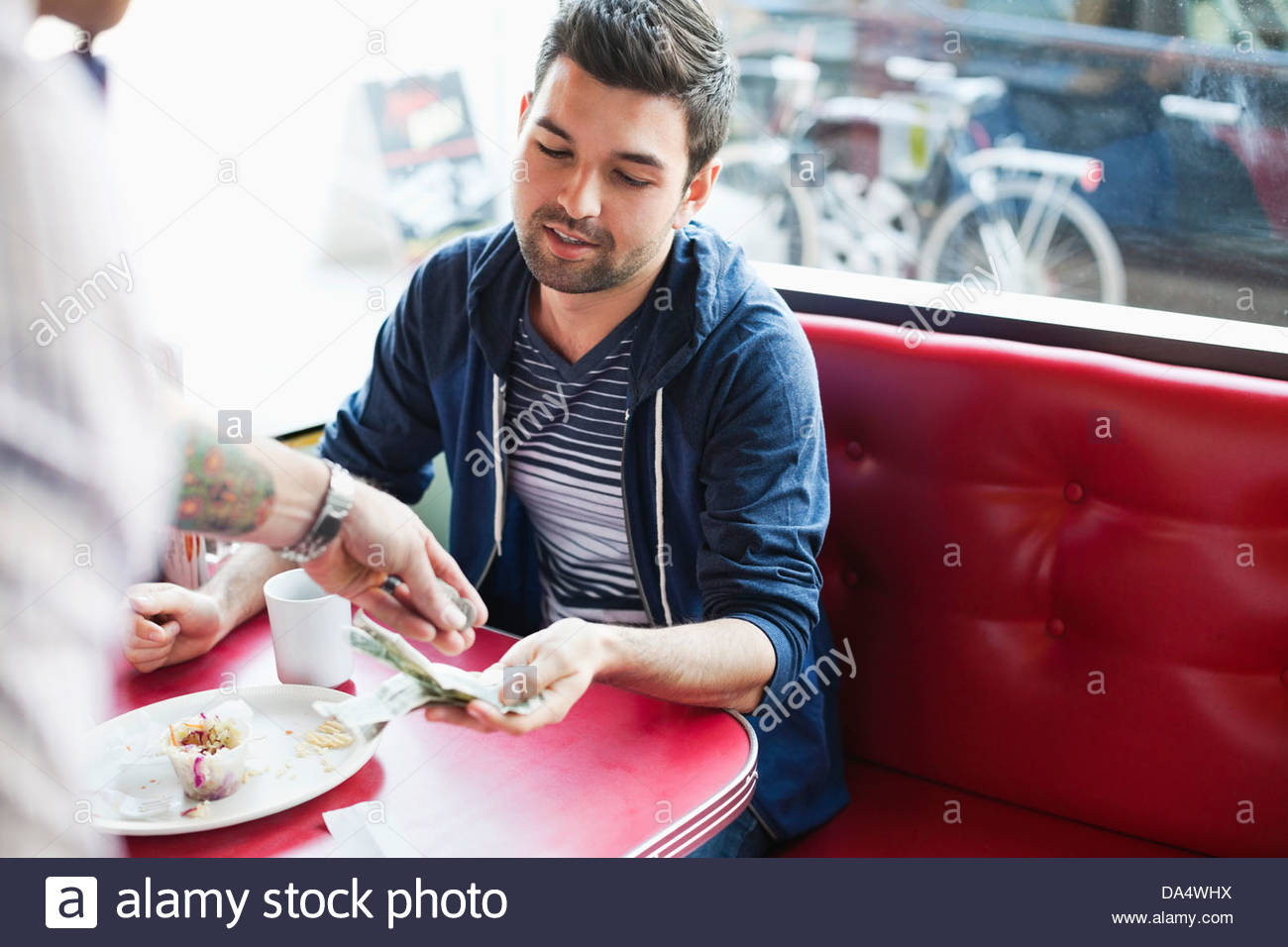 Two Men Sitting In Diner High Resolution Stock Photography and Images ...
