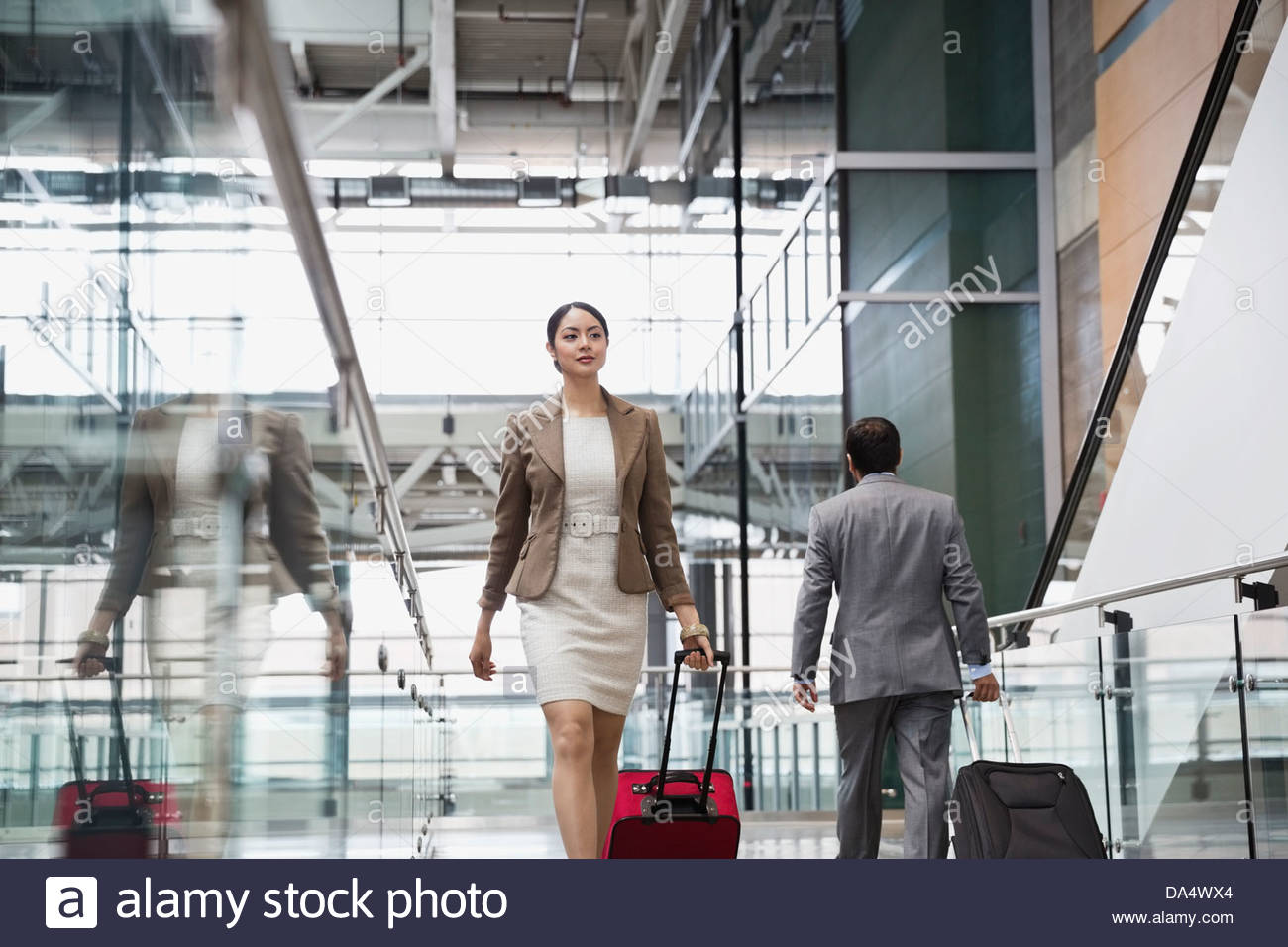 Walking suitcase airport hi-res stock photography and images - Alamy