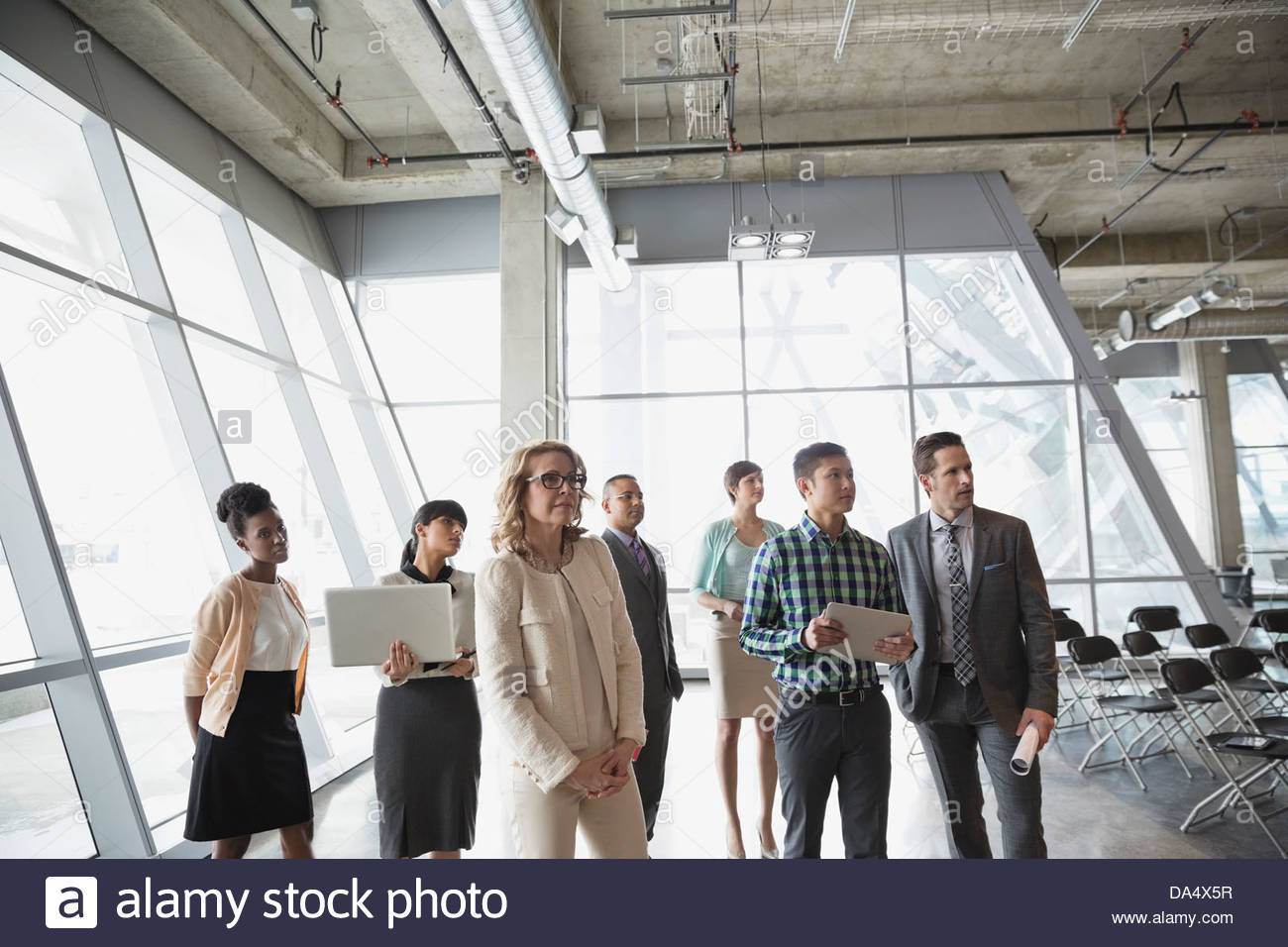 Group of people standing away hi-res stock photography and images - Alamy