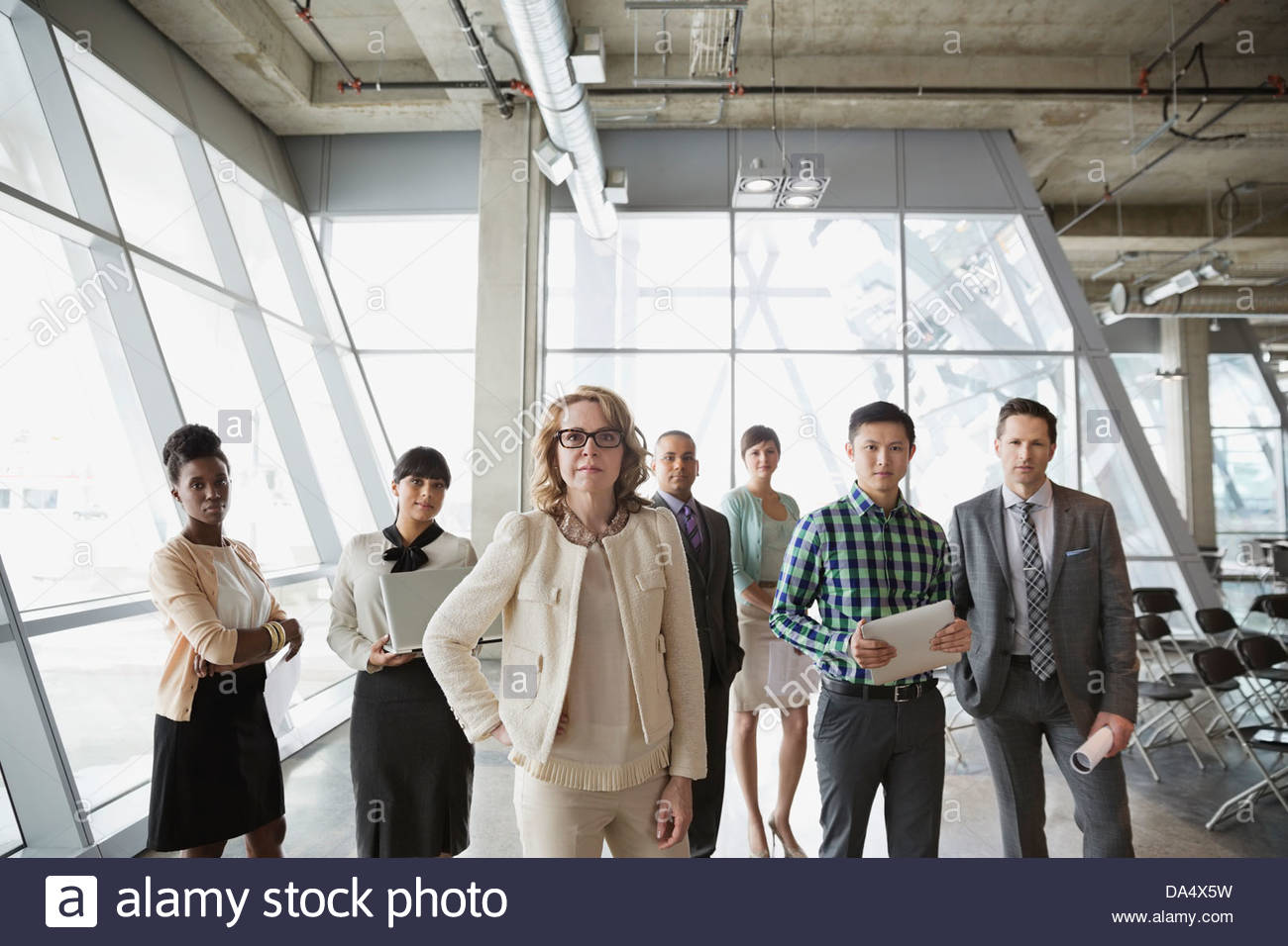 Group of seven people standing hi-res stock photography and images - Alamy