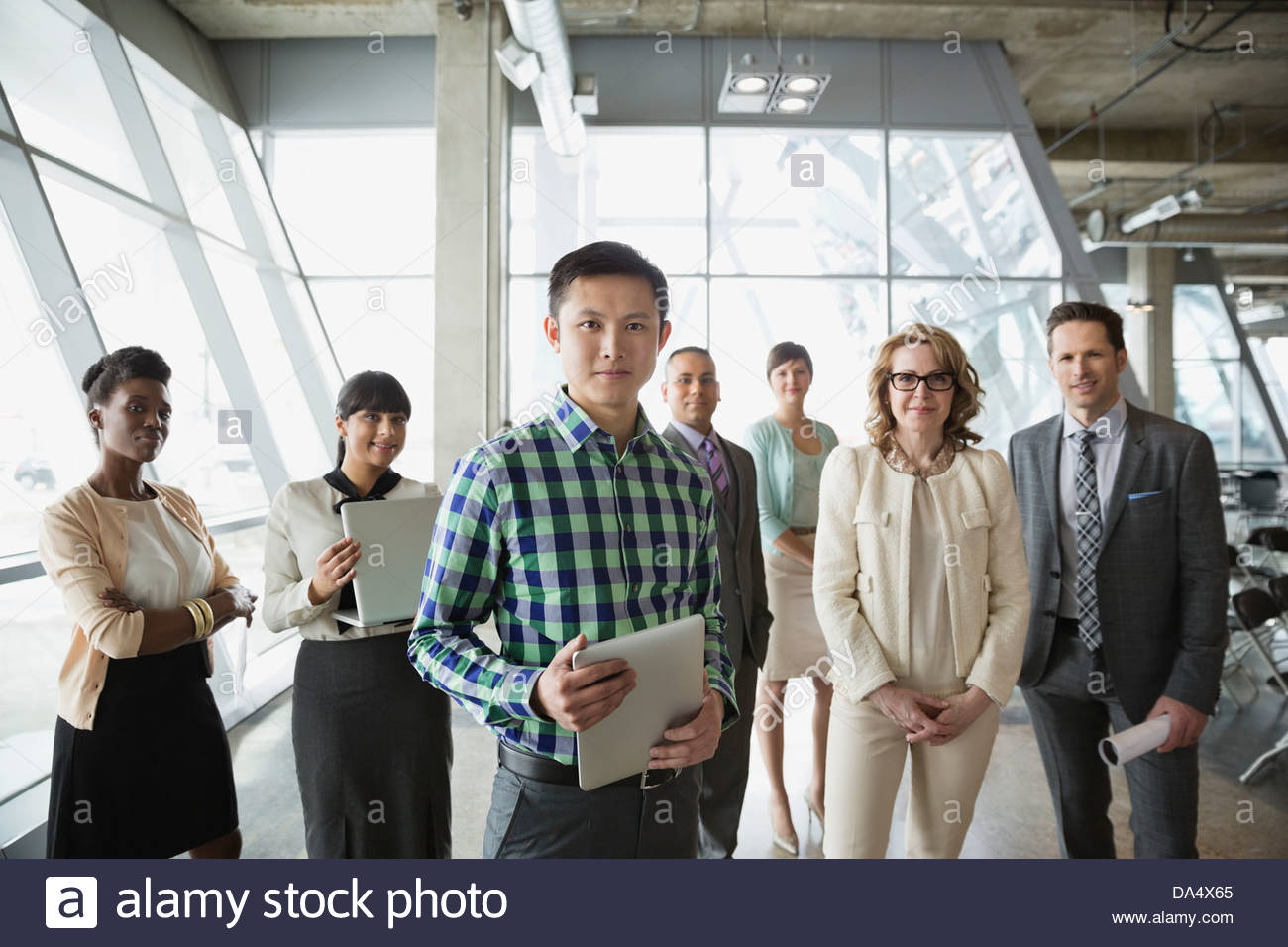 Group of seven people standing hi-res stock photography and images - Alamy